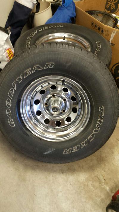 15 inch chrome modular wheels for Chevy truck tires are two of them are ...