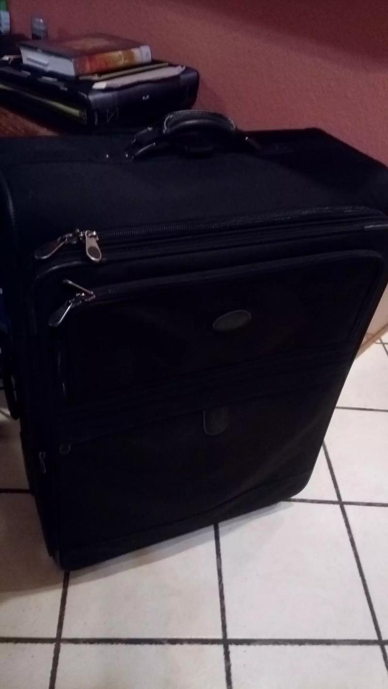 Very large suitcase. All works great. Clean. About 30" x 22" x 12 ...